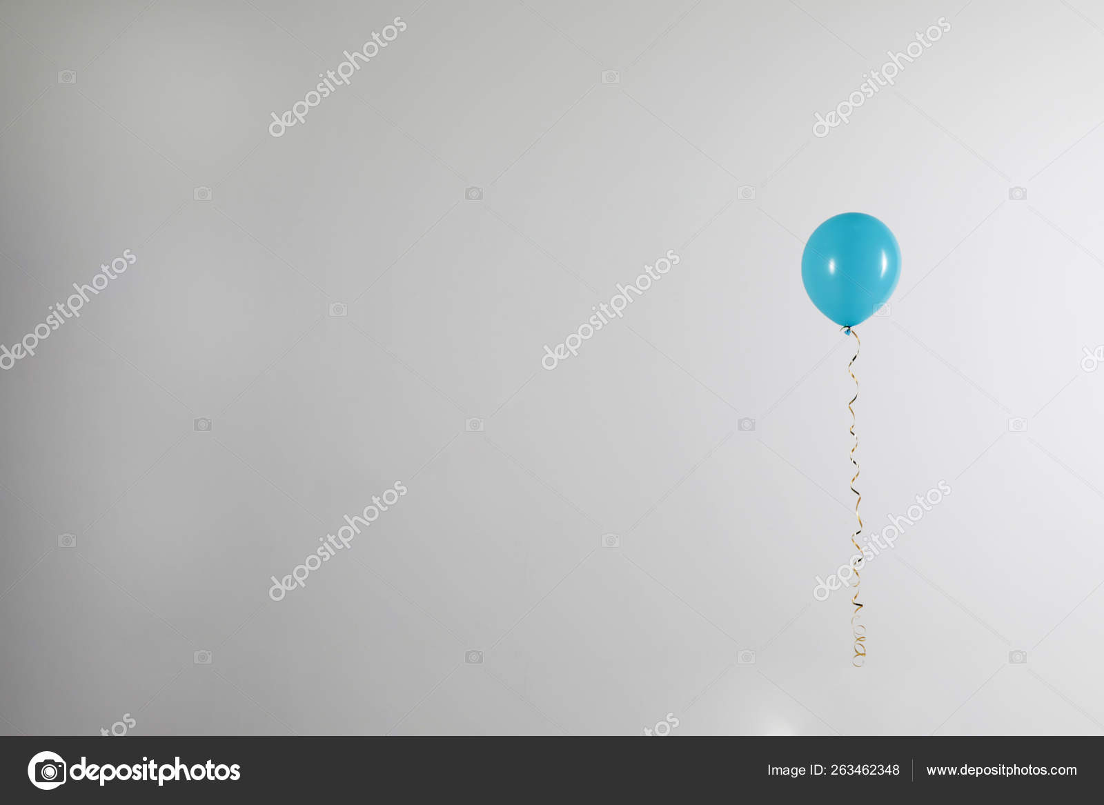Bright balloon on light background, space for text. Celebration time ...