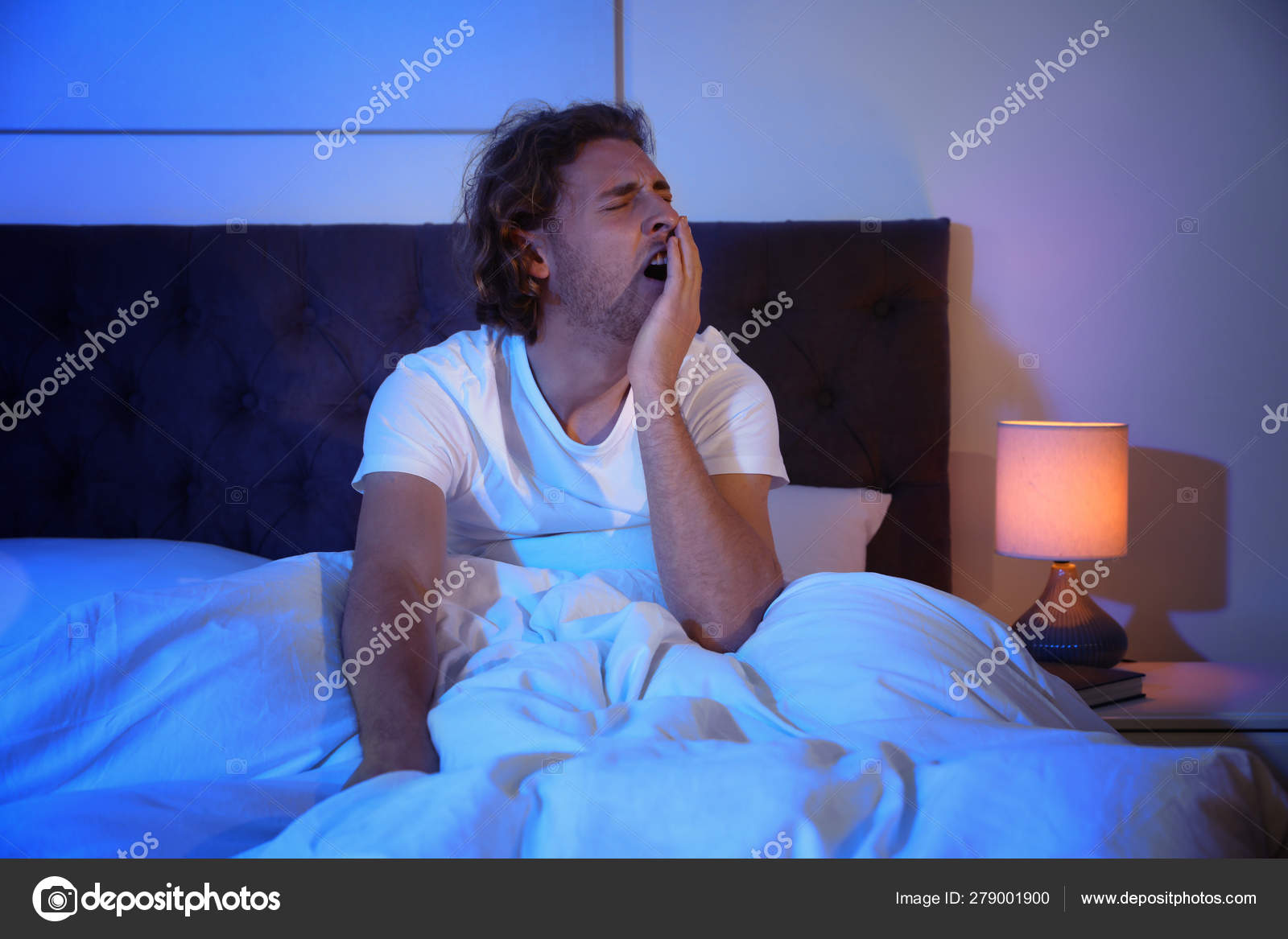 Guy Yawning In Bed