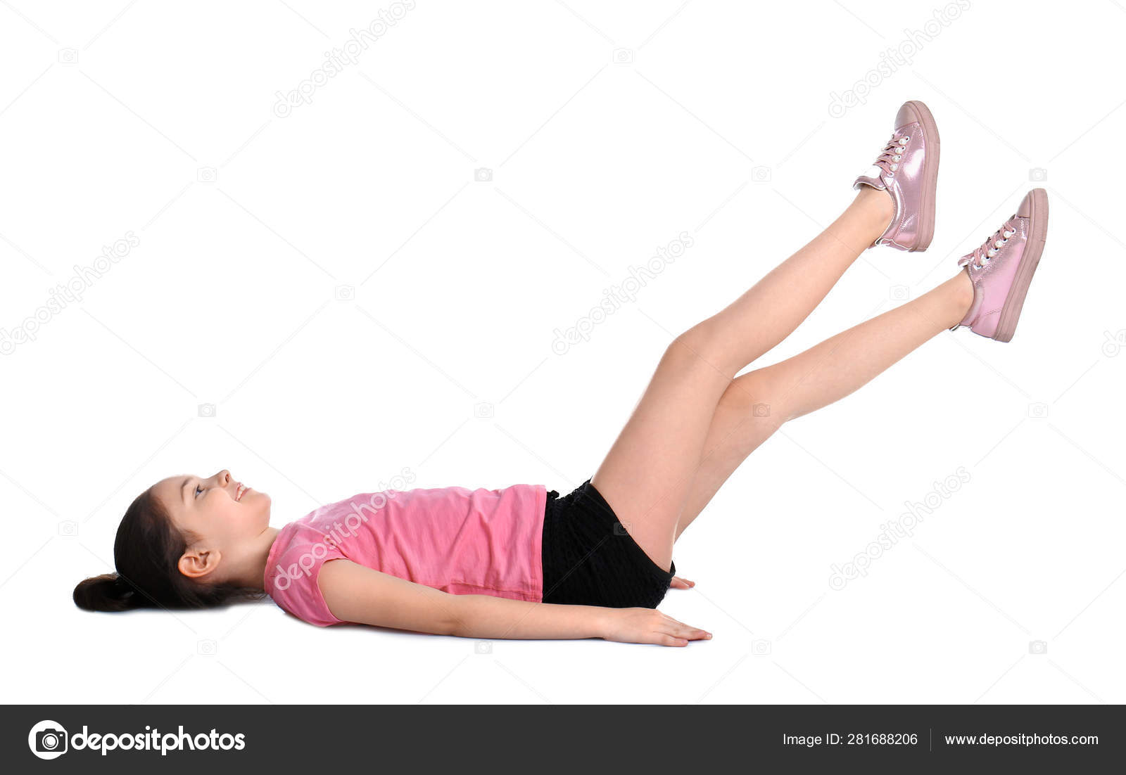 Little girl doing scissors exercise on white background — Stock Photo ...