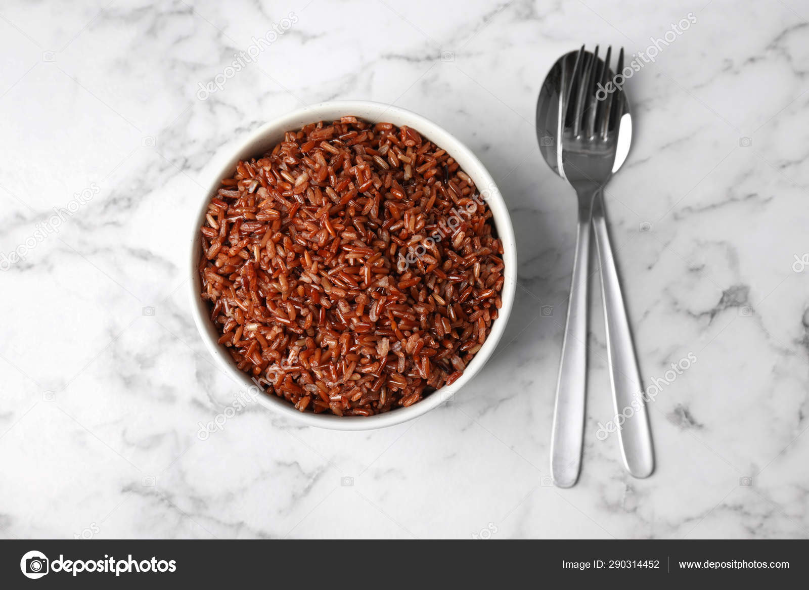 Flat lay composition with delicious cooked brown rice on white marble ...