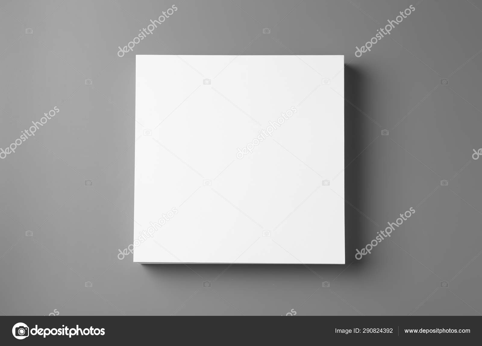 Stack of blank paper sheets for brochure on grey background, top view ...