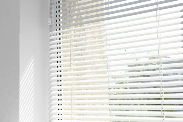 Window with open modern horizontal blinds indoors, closeup - Stock ...