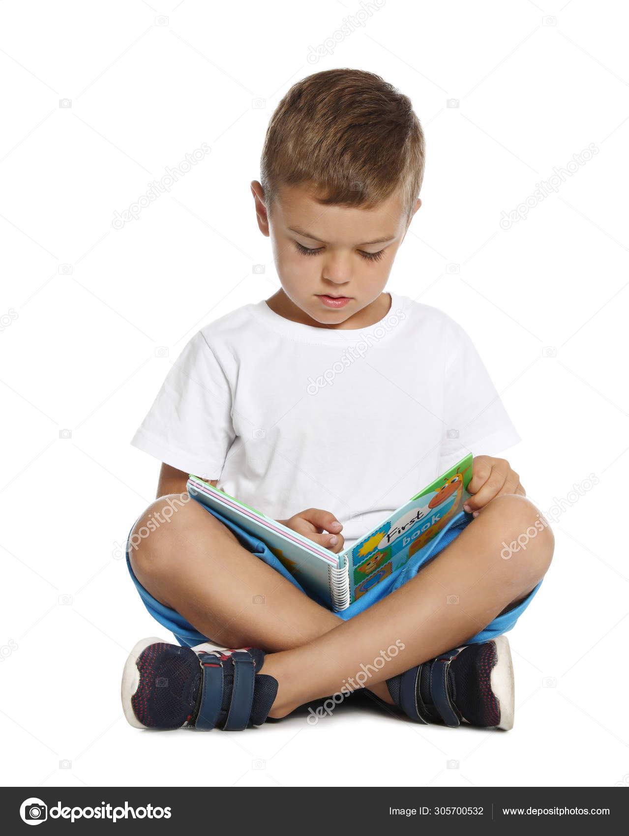 Cute little boy reading book on white background Stock Photo by ...