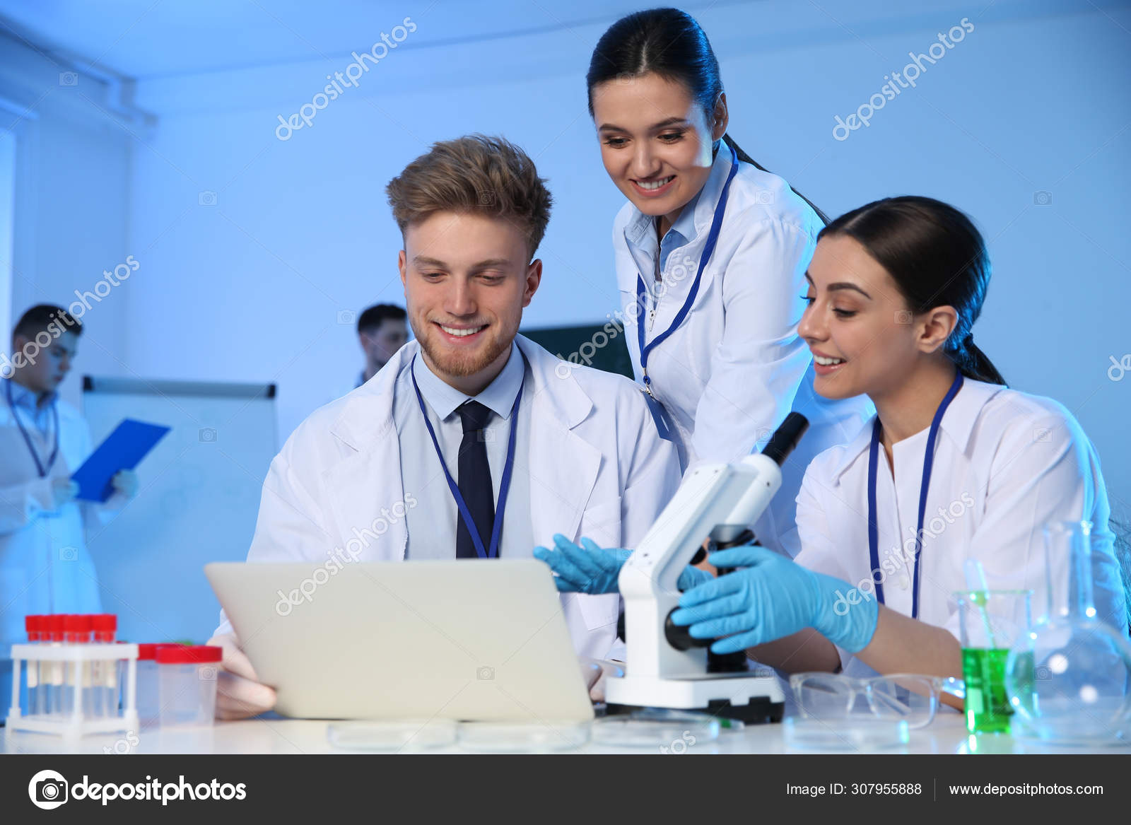 Group of scientists working in modern chemistry laboratory — Stock ...