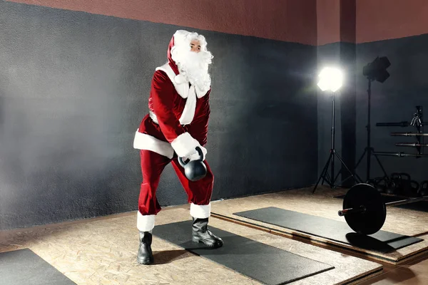 Santa lifting weights Stock Photos, Royalty Free Santa lifting weights ...