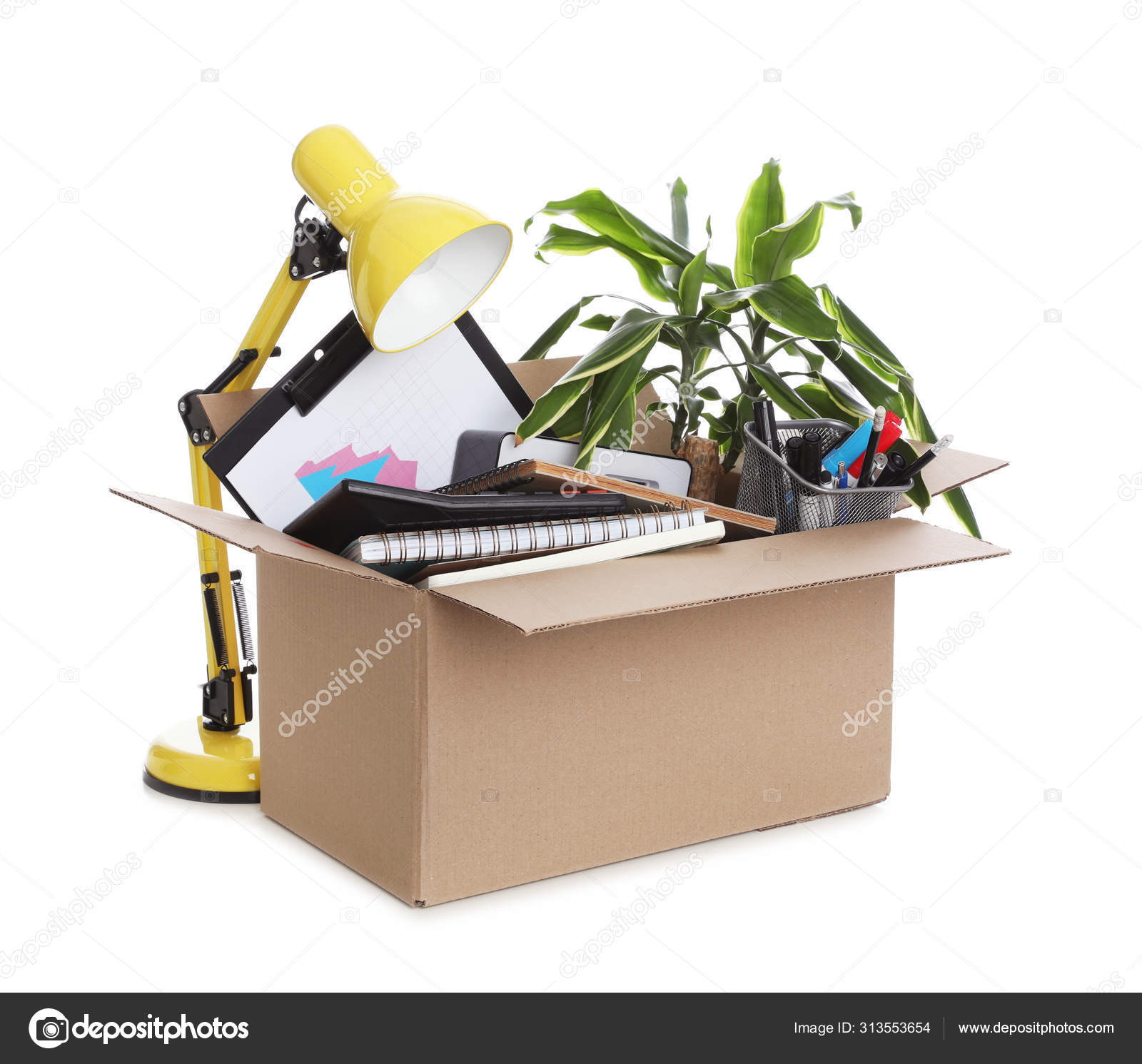 Cardboard box full of office stuff on white background Stock Photo by ...