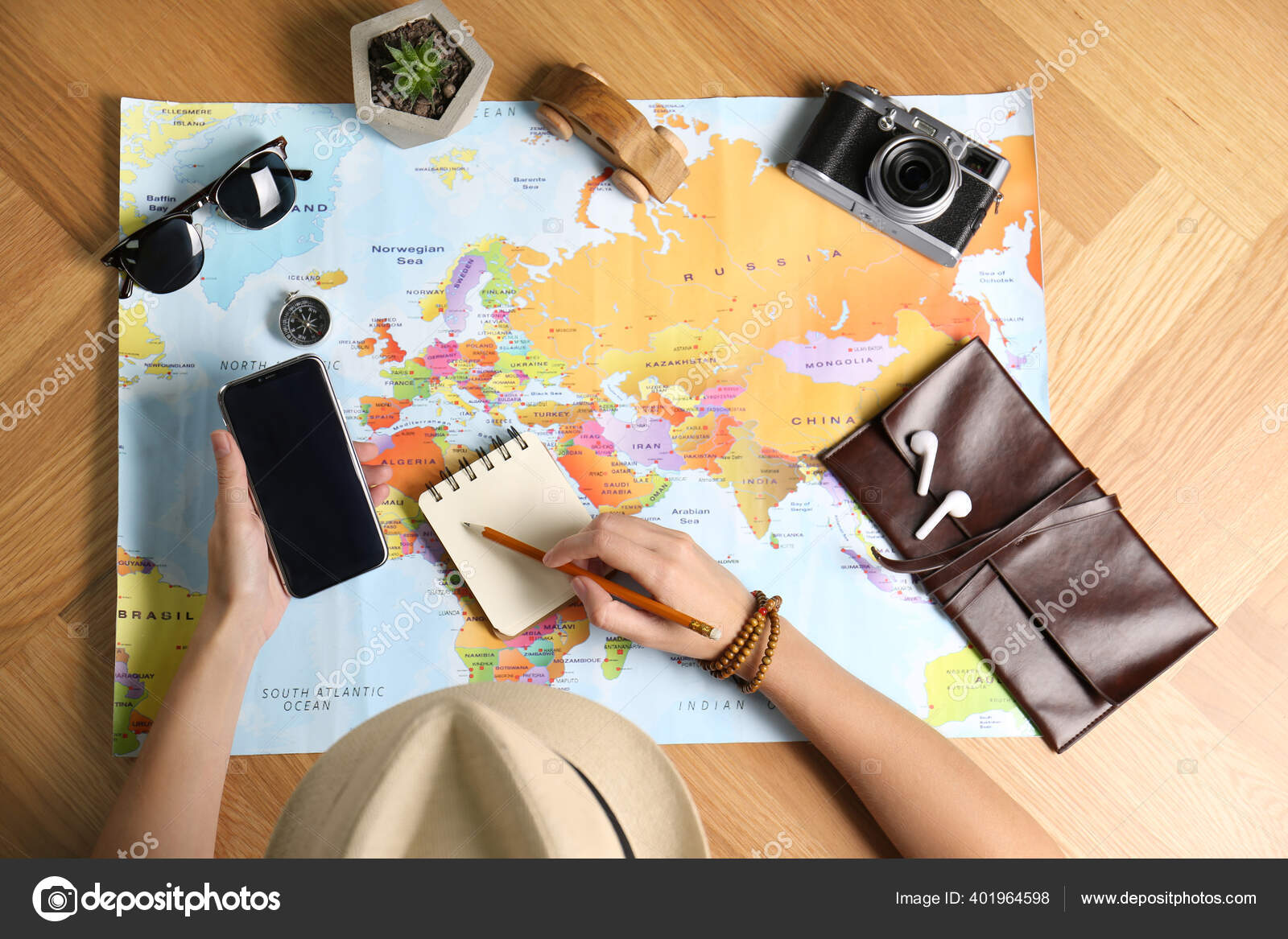 Woman Smartphone World Map Planning Trip Wooden Table Top View Stock ...
