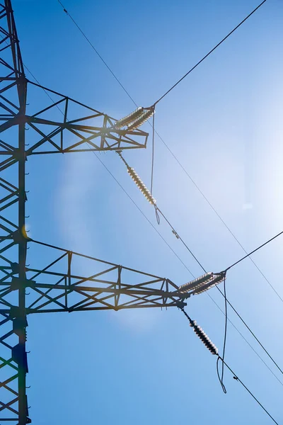 Pillar overhead power line.High voltage power lines against the sky in ...