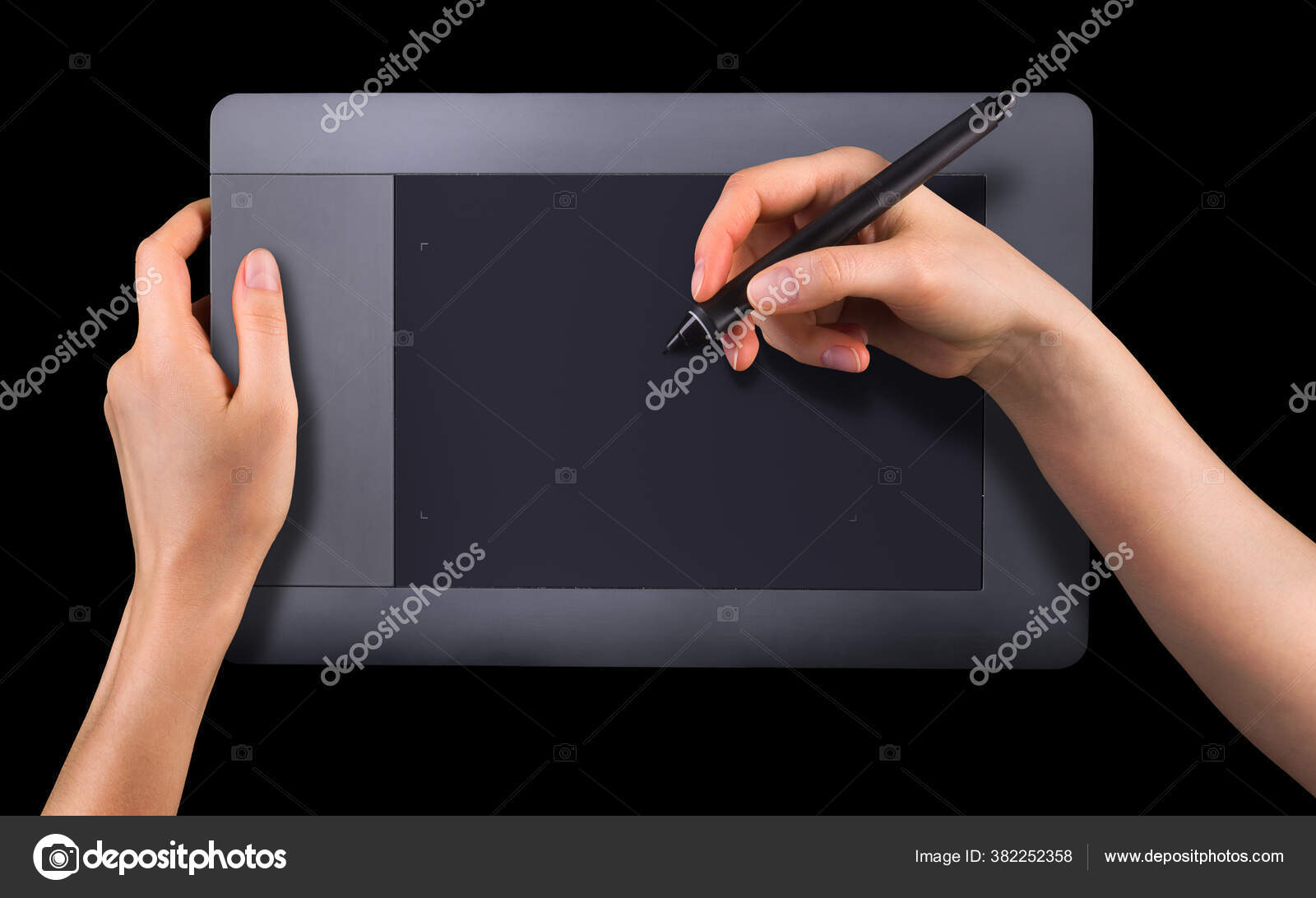 Hand holding digital graphic pen and drawing graphic tablet isolated on ...