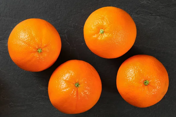 Four Oranges