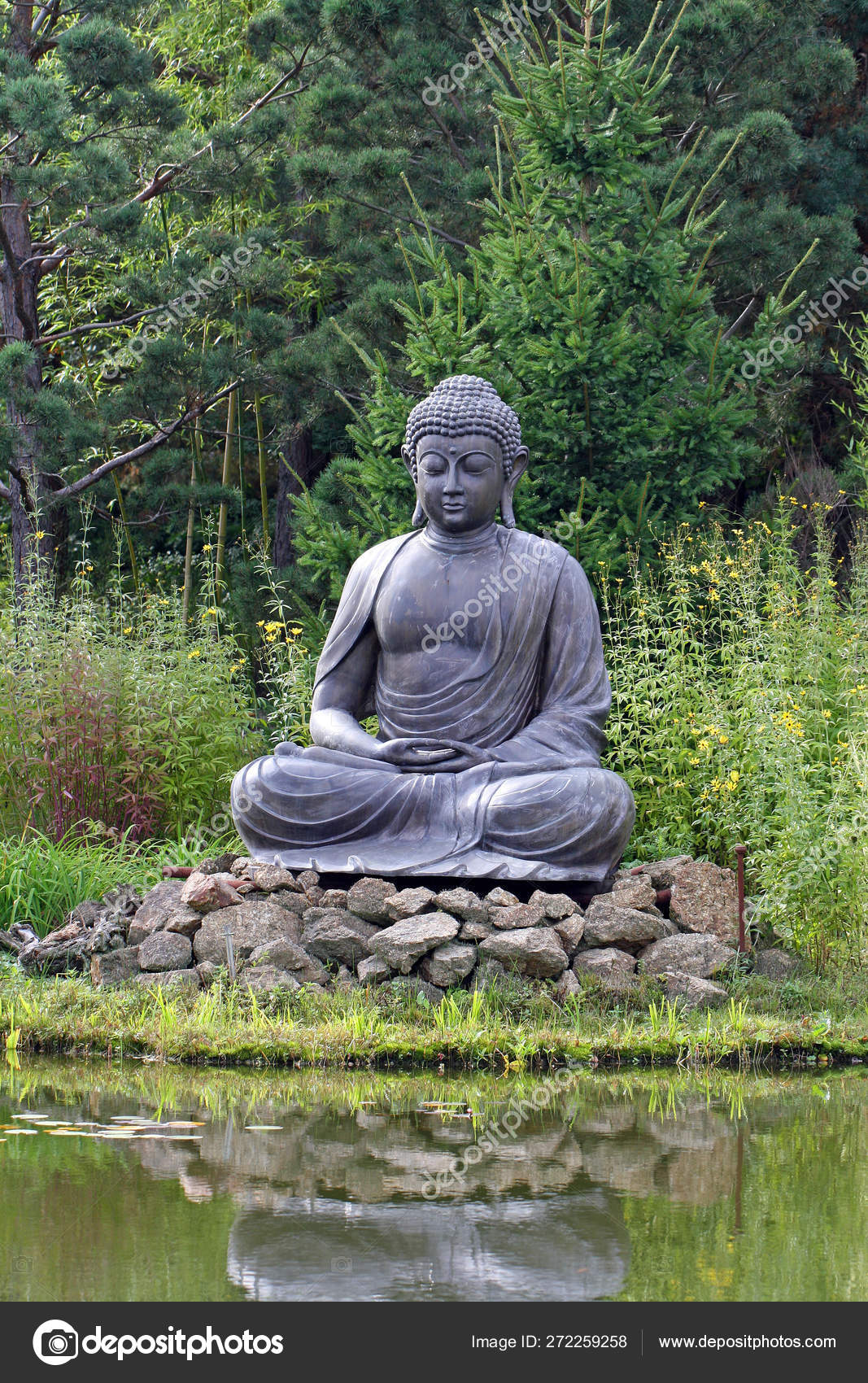 Buddha statue meditating in front of lake, in the nature Stock Photo by ...