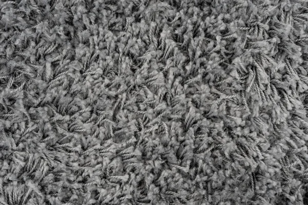 Black natural fleece carpet texture background. Dark wool fabric ...
