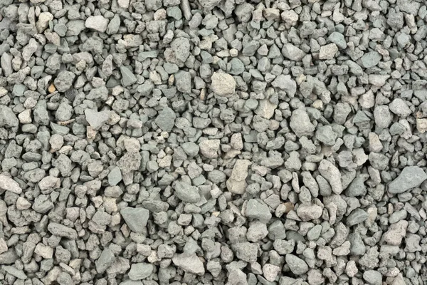 Gray small rocks ground texture. black small road stone background ...