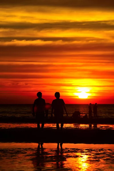 Beach sunset people Stock Photos, Royalty Free Beach sunset people ...