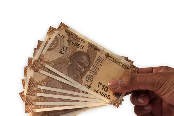 Hand holding Indian New 100 rupee notes on isolated background Stock ...