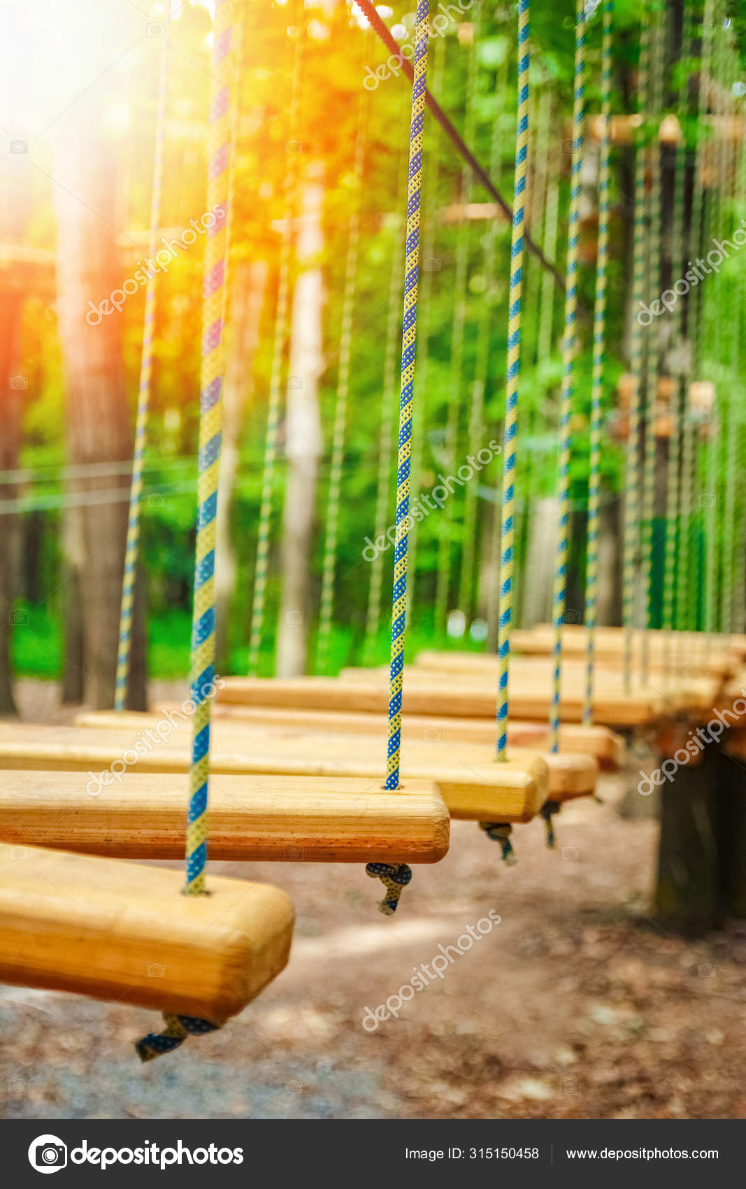 Beautiful rope and net climbing in the park on the nature — Stock Photo ...