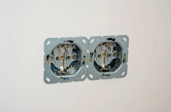 Two sockets during installation without cover. During the repair. open ...