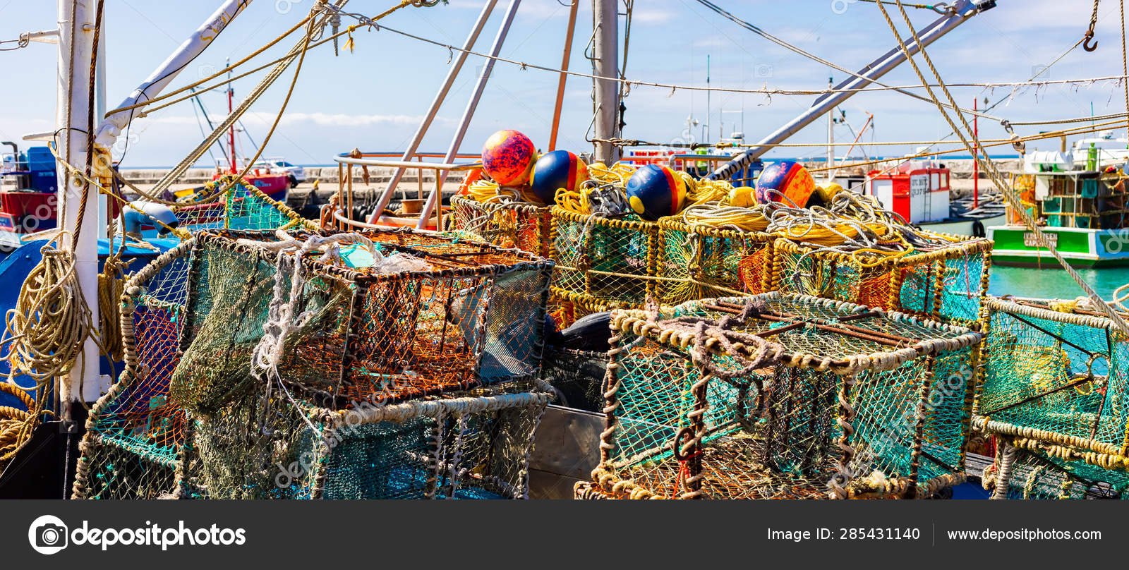Crayfish nets and traps on a small fishing boat Stock Photo by ...
