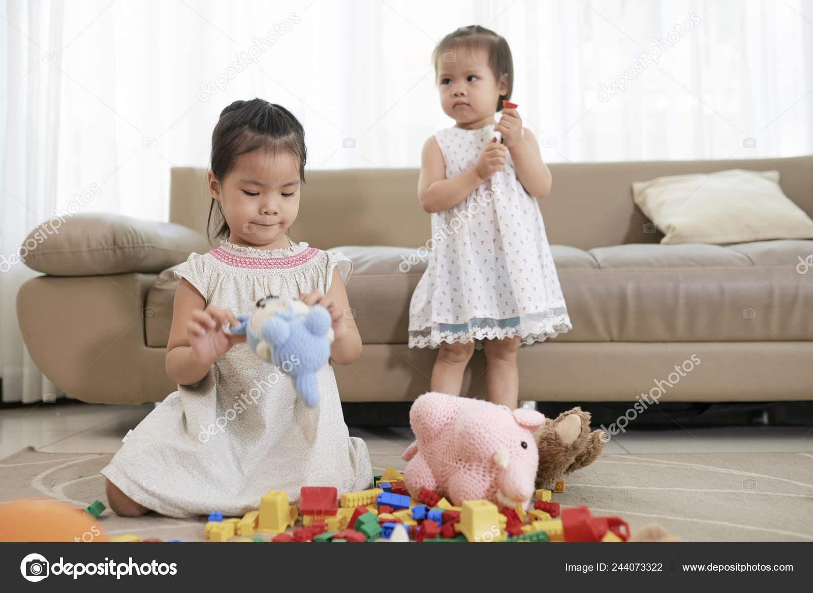 Two Little Sisters Playing Together Various Toys Stock Photo by ...