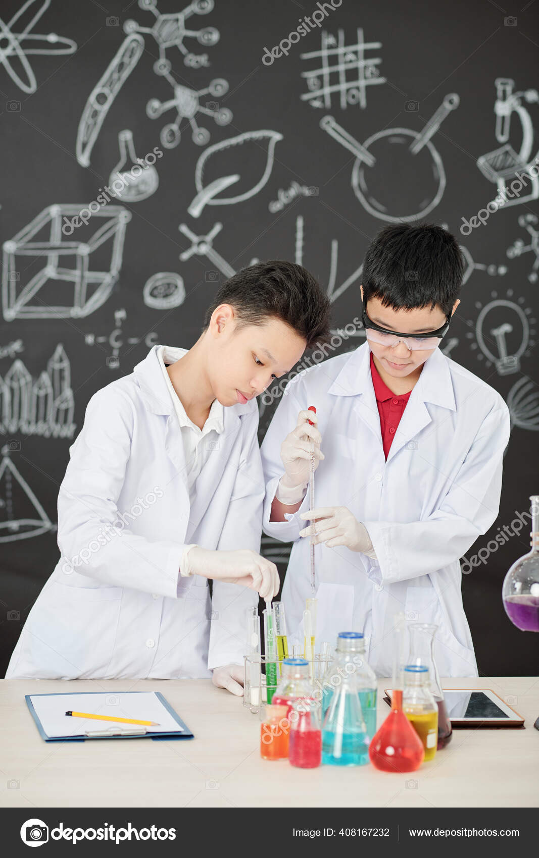 Concentrated Asian Students Working Pairs Chemistry Class Mixing ...