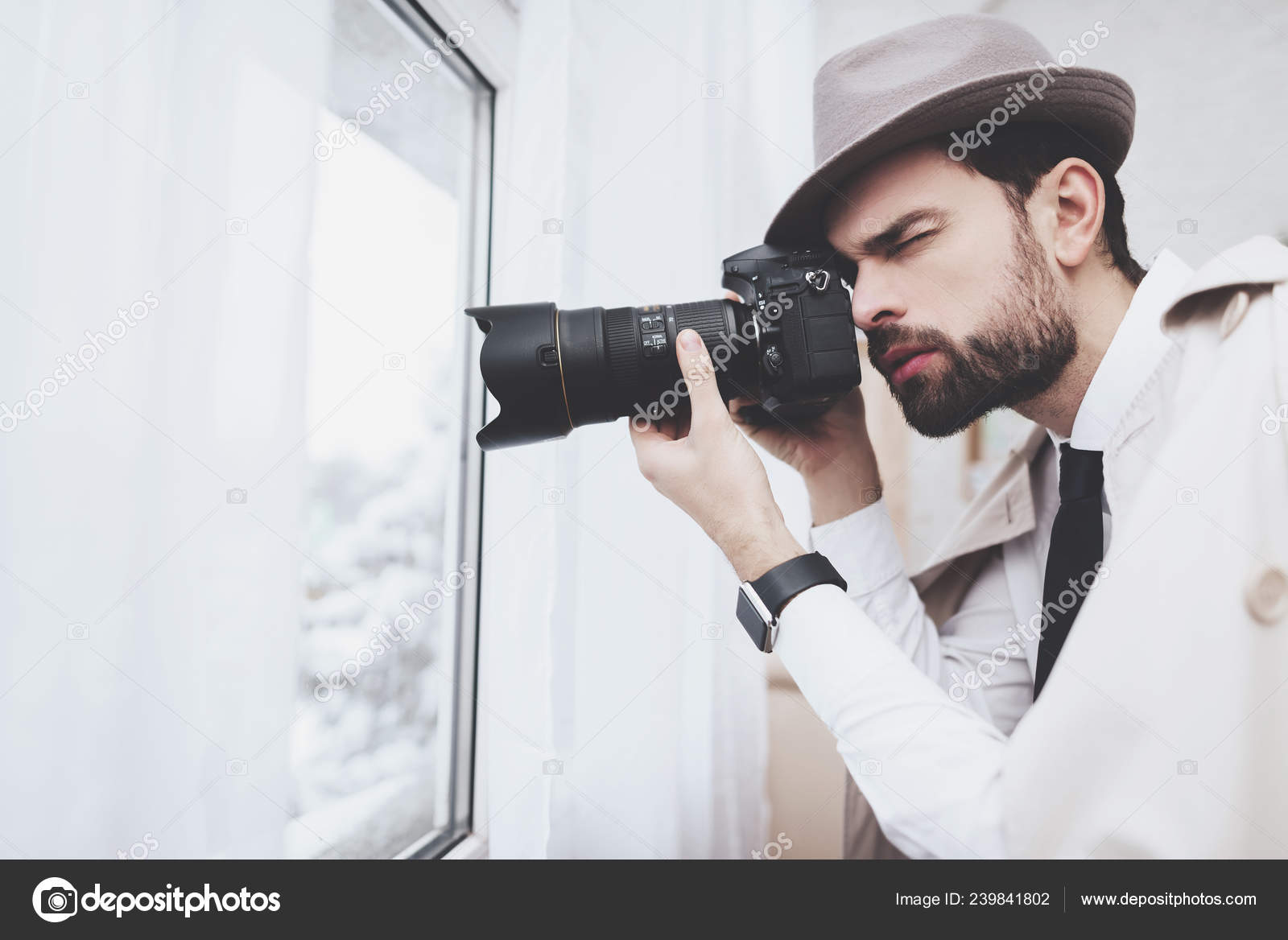 Private detective agency. Man is taking photos in window. — Stock Photo ...