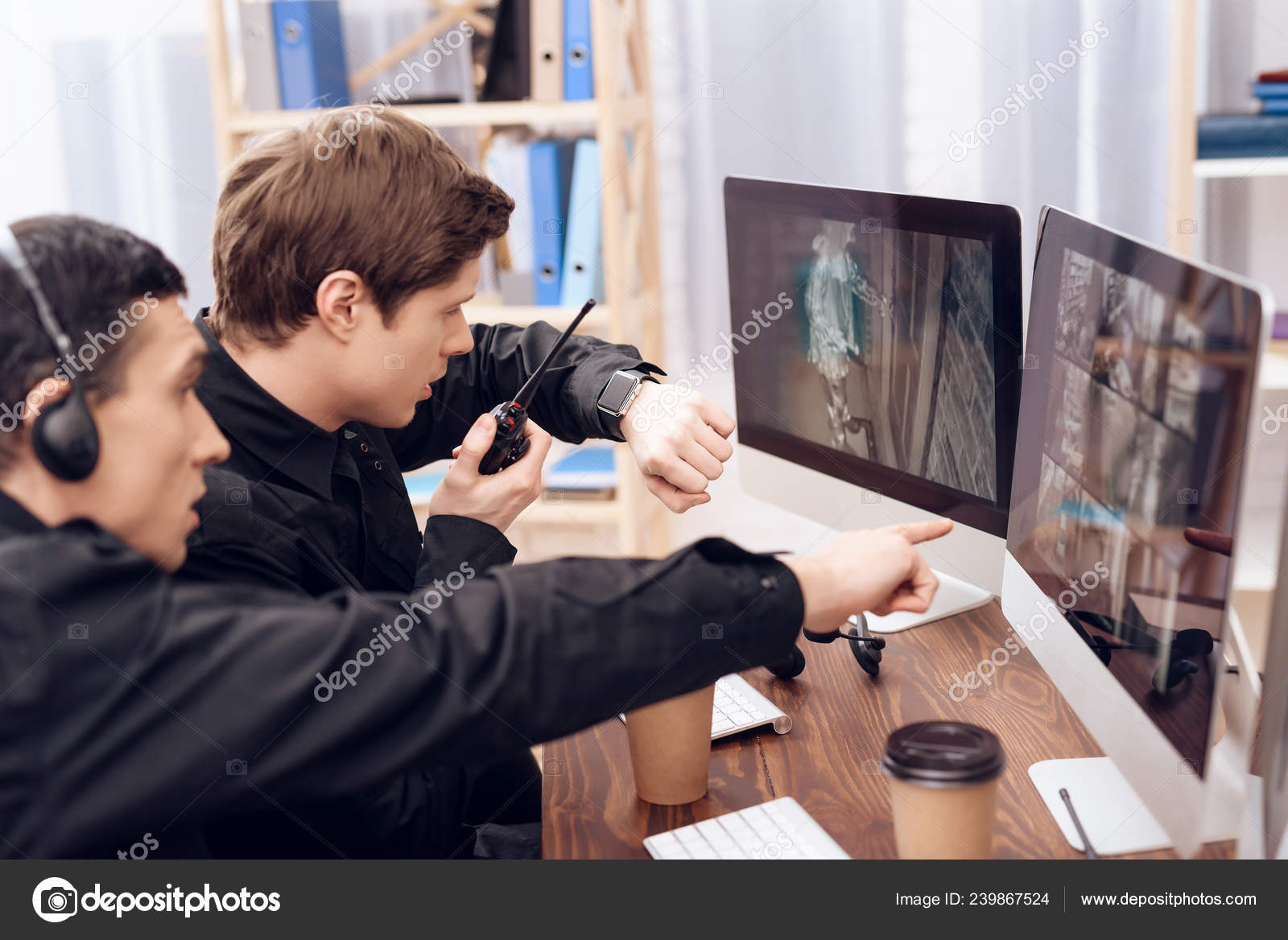 Two men work as guards. Stock Photo by ©stockveres.gmail.com 239867524