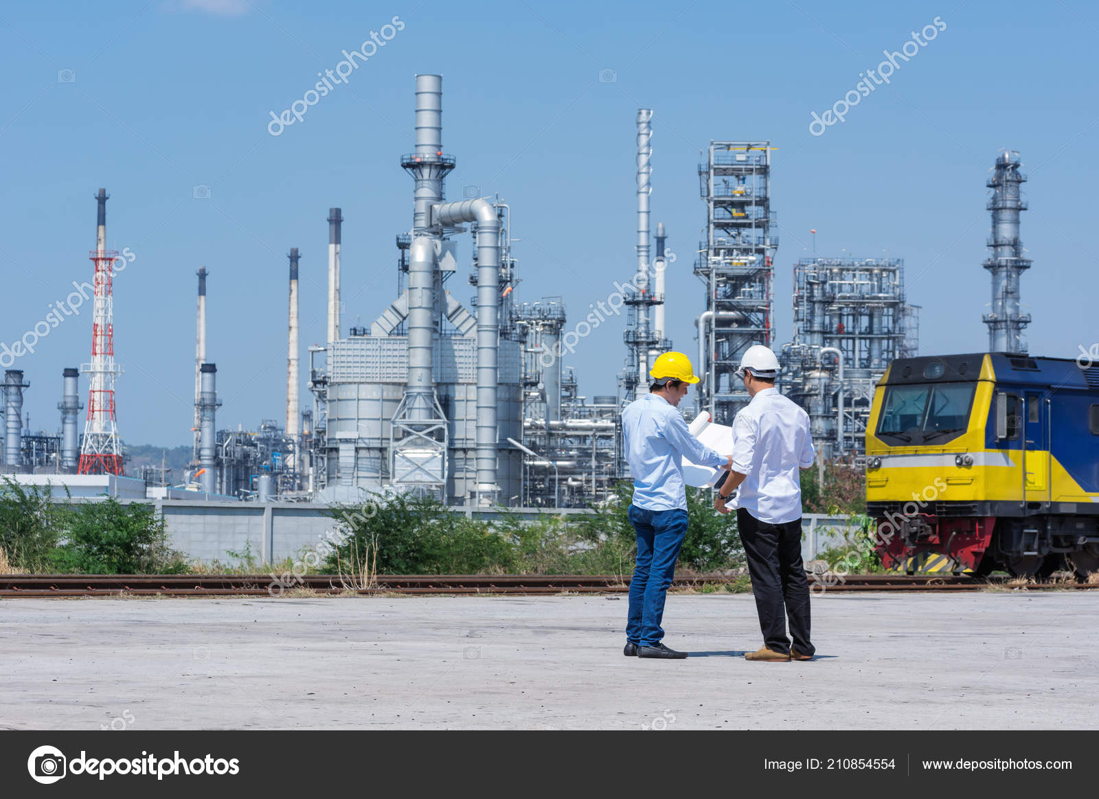 Engineer Wearing White Helmet Standing Refinery Background Stock Photo ...