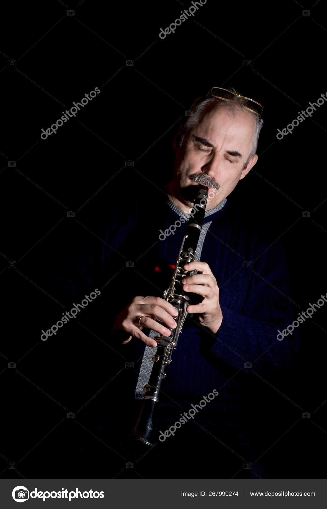 Mature Man Playing Clarinet Jazz — Stock Photo © yurikr #267990274