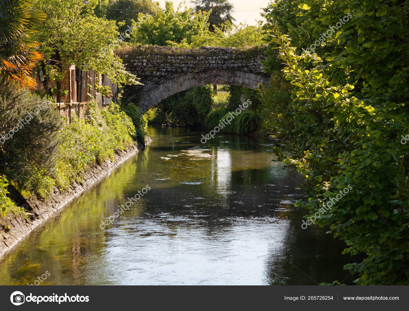 Ancient Bridge over a Canal Stock Photo by ©emmeci74 265728254