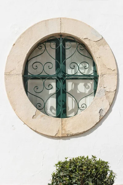 Round window on the background of a white wall. Close-up. - Stock Image ...