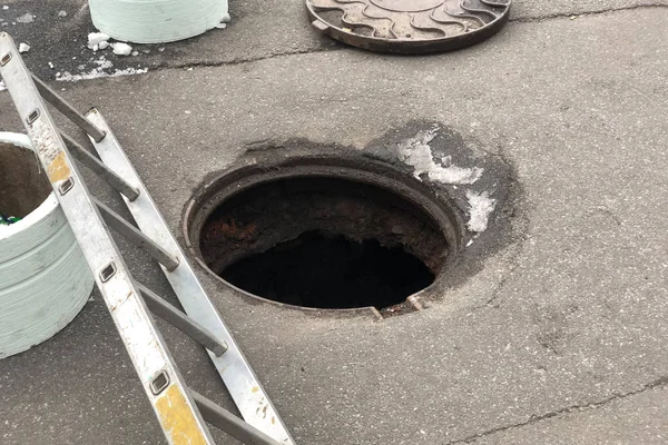 Manhole leak repair Stock Photos, Royalty Free Manhole leak repair ...