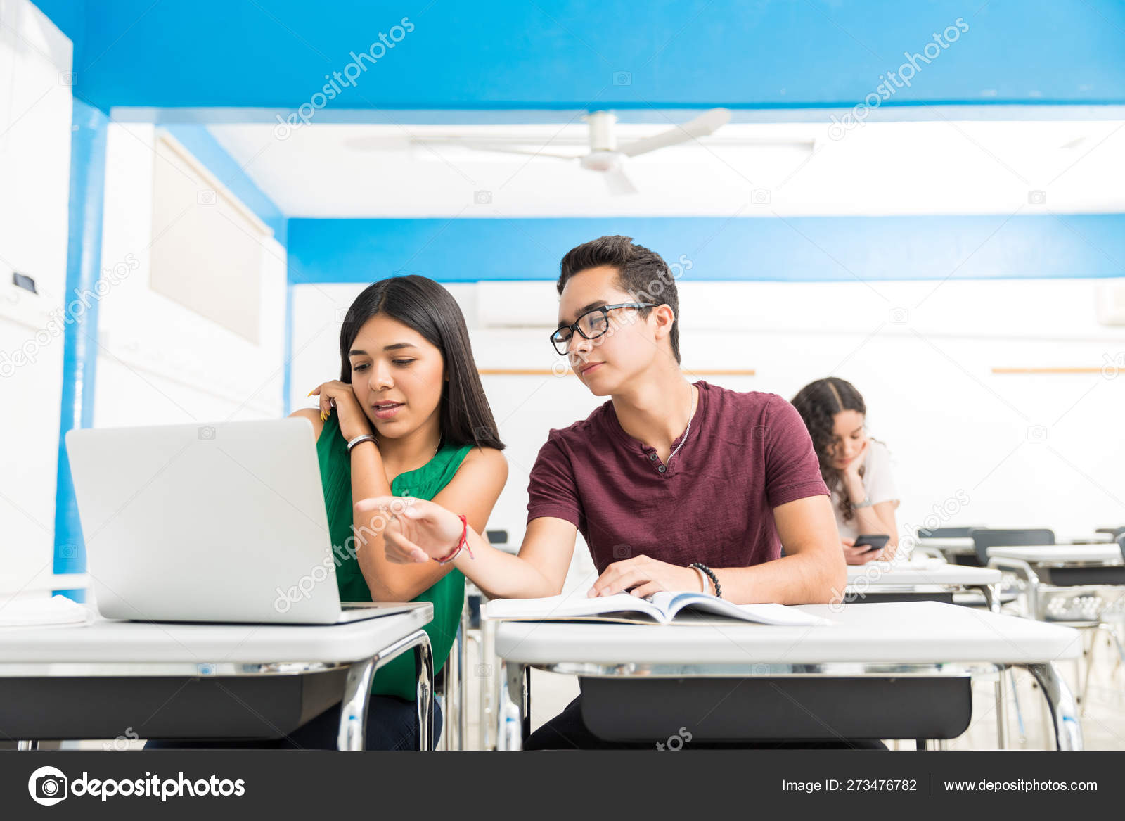 Teenage Boy Assisting Classmate Using Laptop Class — Stock Photo ...