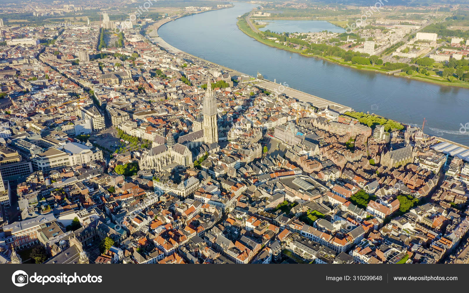 Antwerp, Belgium. Flying over the roofs of the historic city. Schelde ...