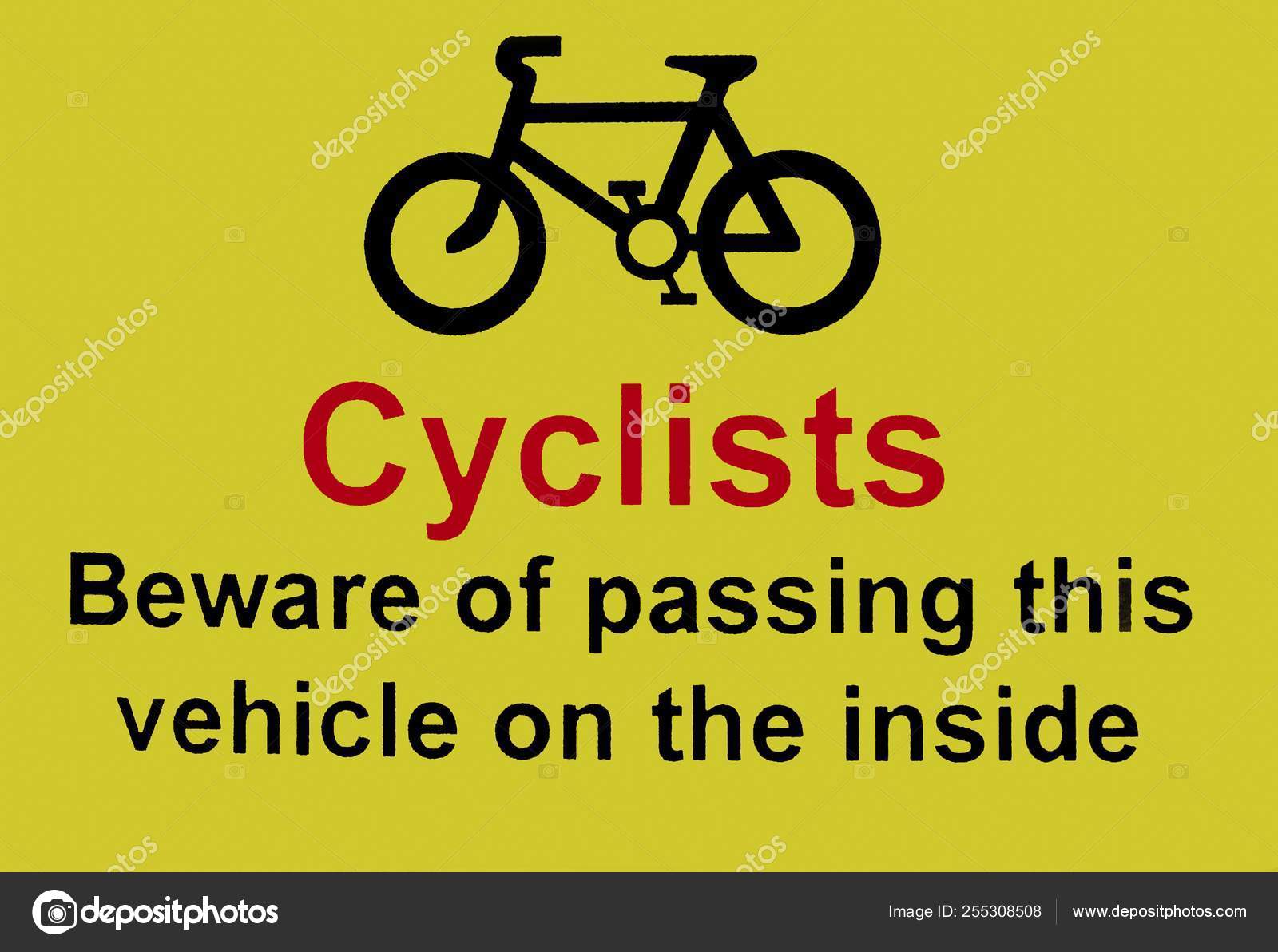 Cyclists beware of passing the vehicle on the inside sign — Stock Photo ...