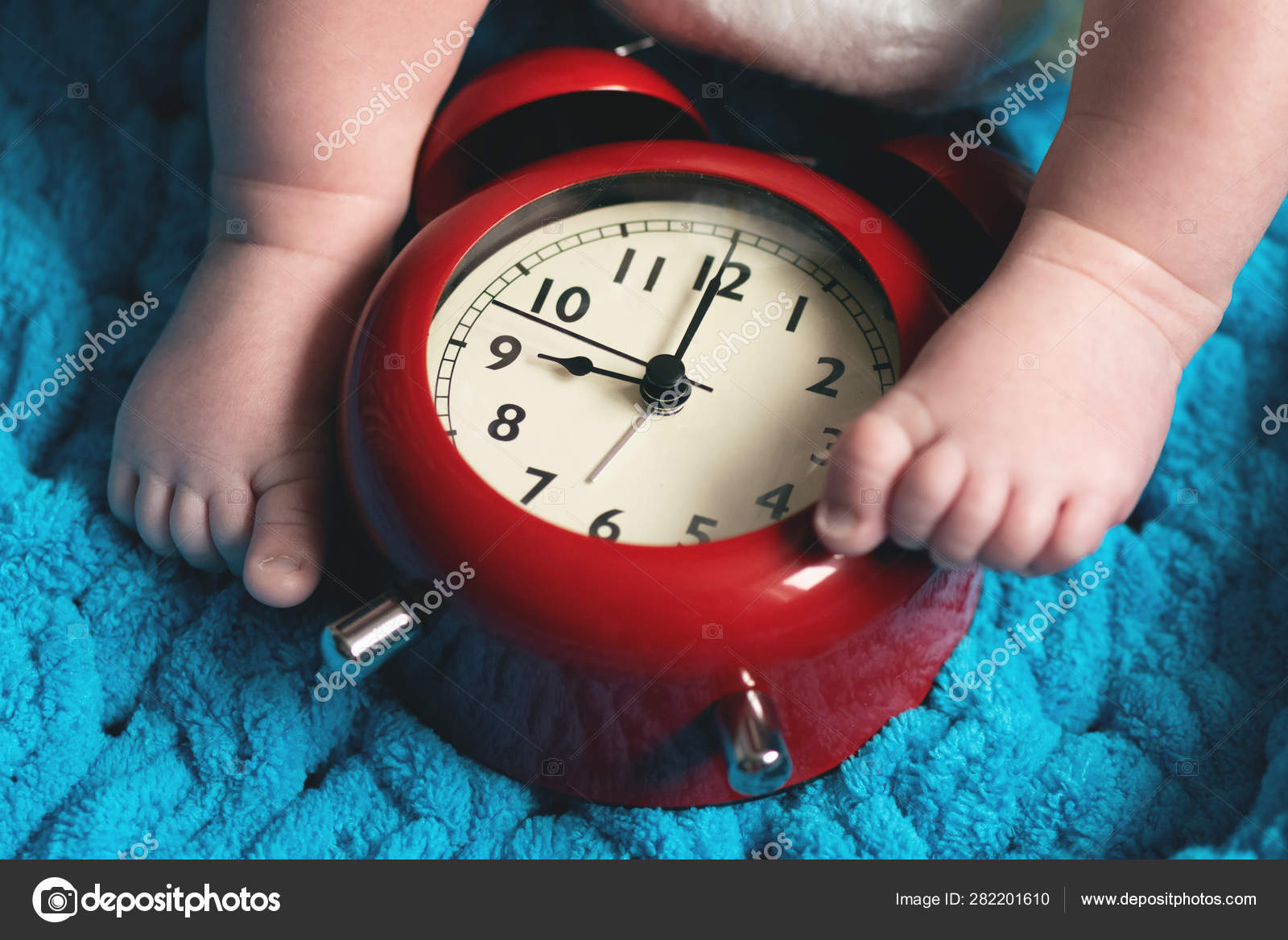 Baby Feet Red Alarm Clock Blue Towel Background Stock Photo by ...