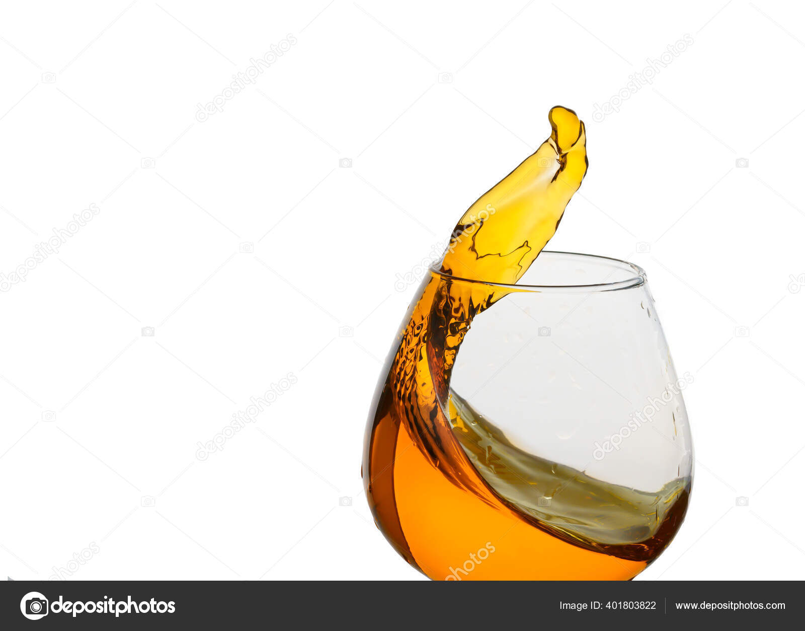 Freeze Action Photography .Splash of Cognac In glass Isolated on White ...