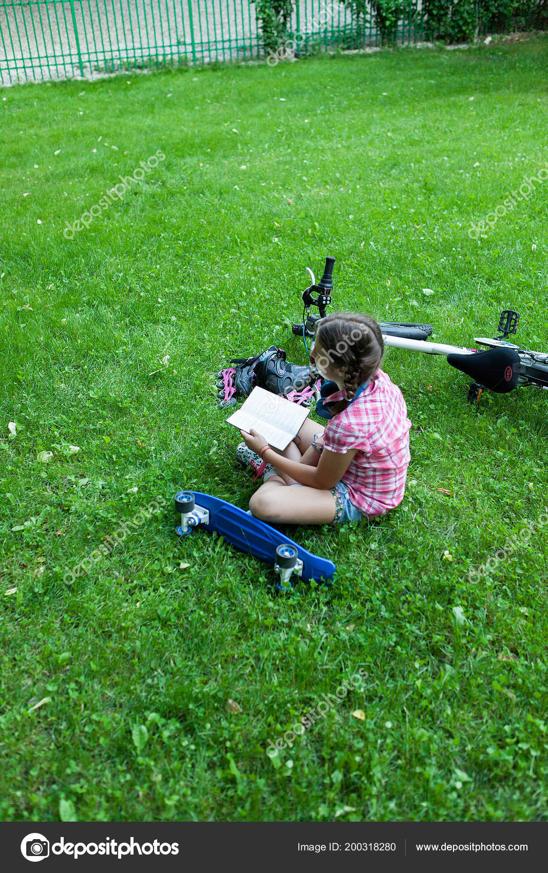 Girl reading a good book — Stock Photo © DragosCondreaW #200318280