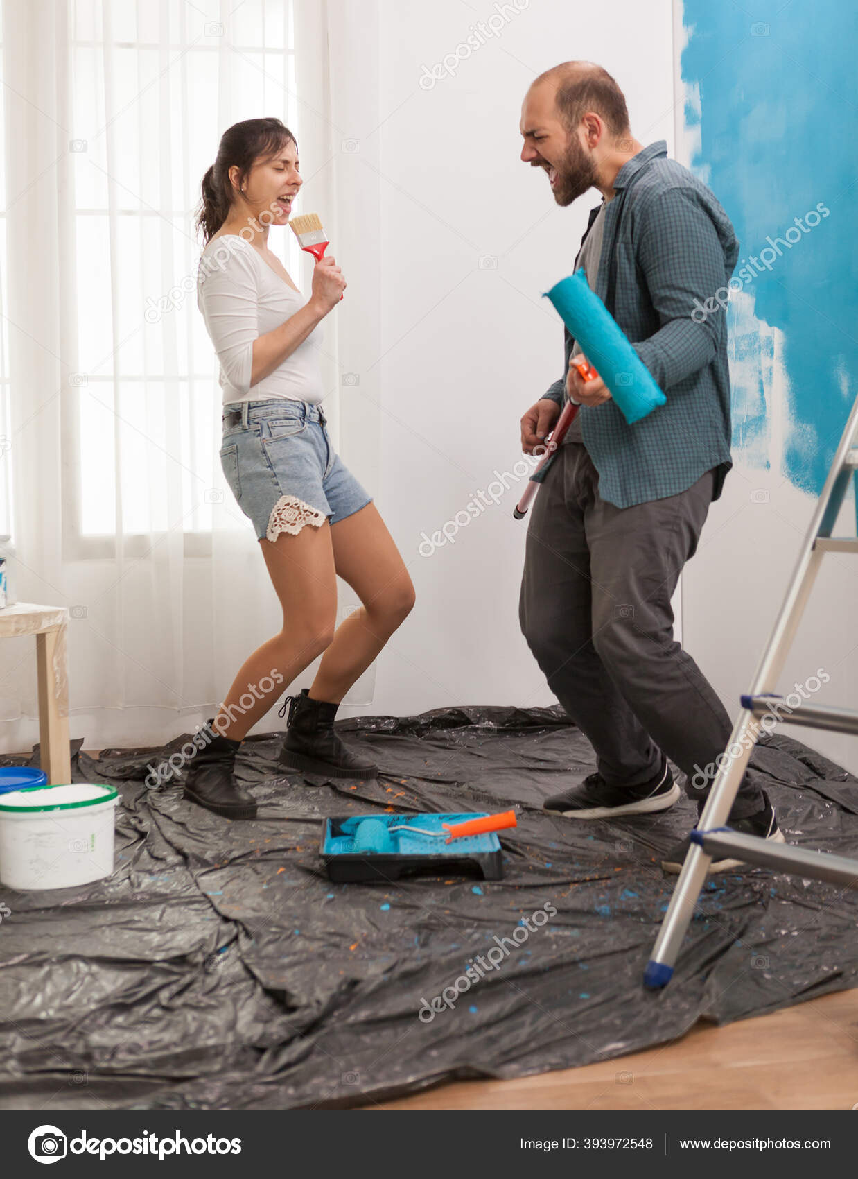 Girl singing on paint brush and decorating Stock Photo by ...