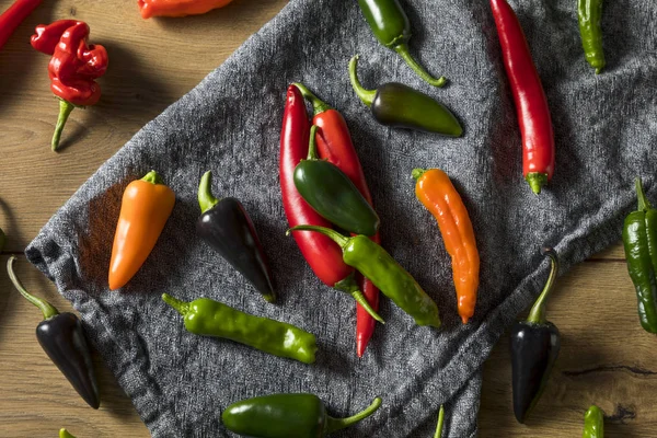 Raw Organic Assorted Hot Peppers Ready to Cook - Stock Image - Everypixel
