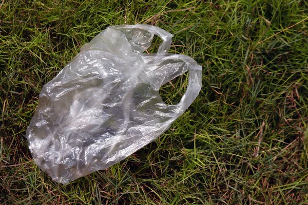 bag waste, plastic garbage bags on the grass, bag plastic waste on ...