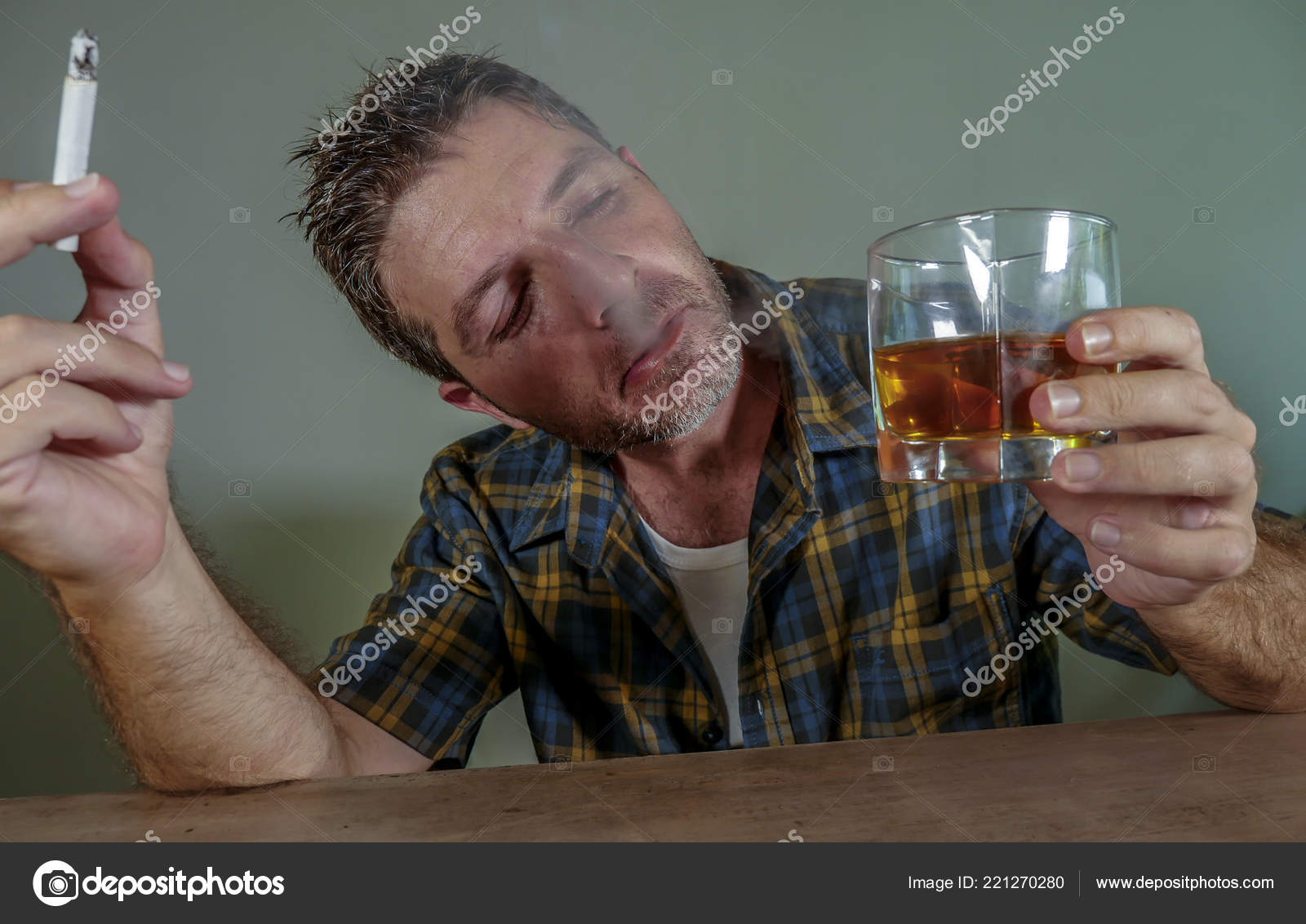 Young Messy Wasted Addict Man Smoking Cigarette Having Alcoholic Drink ...