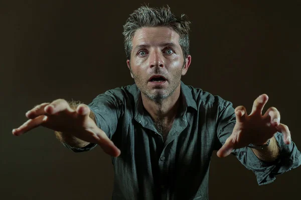 hypnotized and mesmerized facial expression portrait of young ...