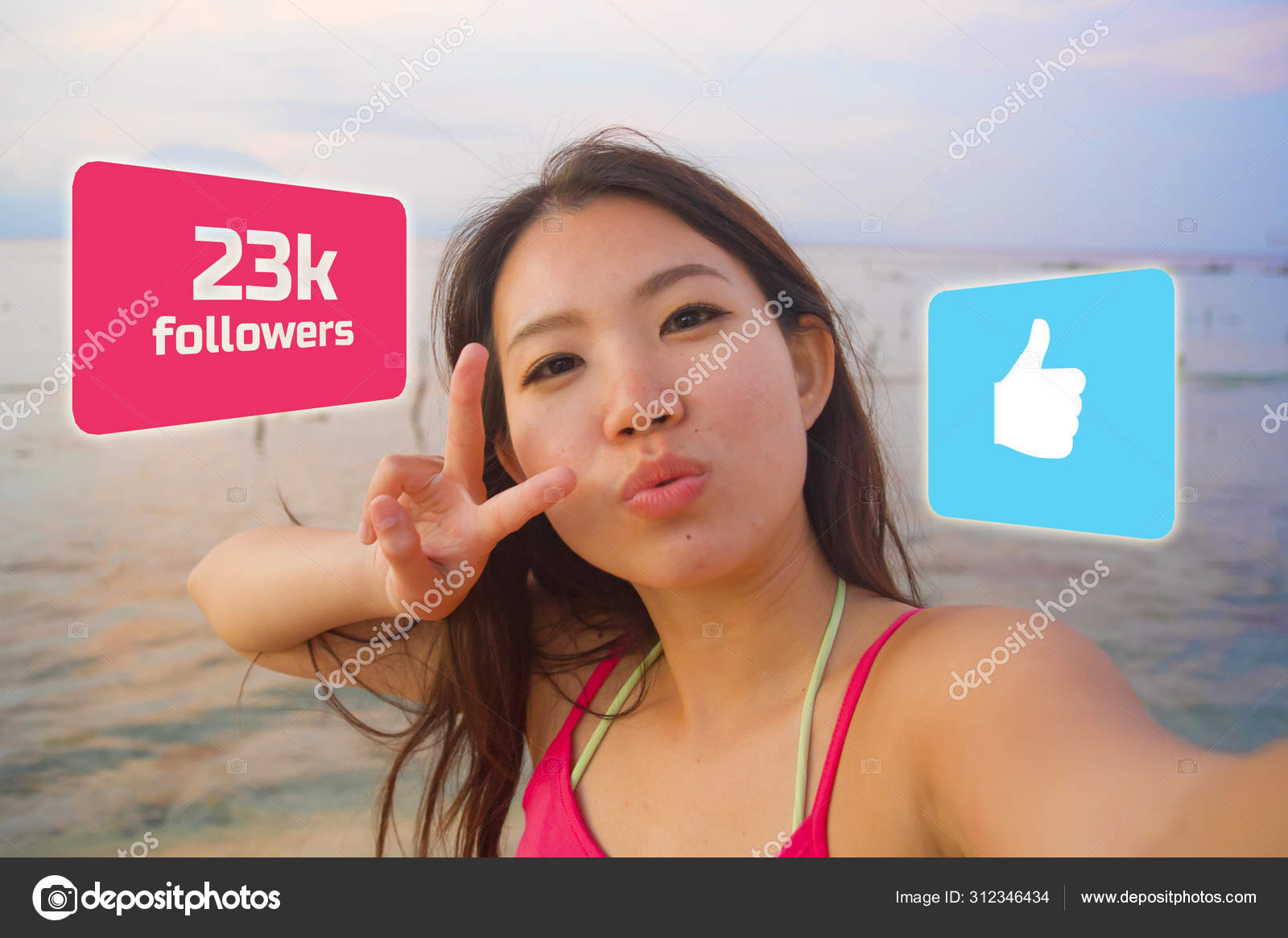 Young beautiful and happy influencer Korean woman taking self portrait ...