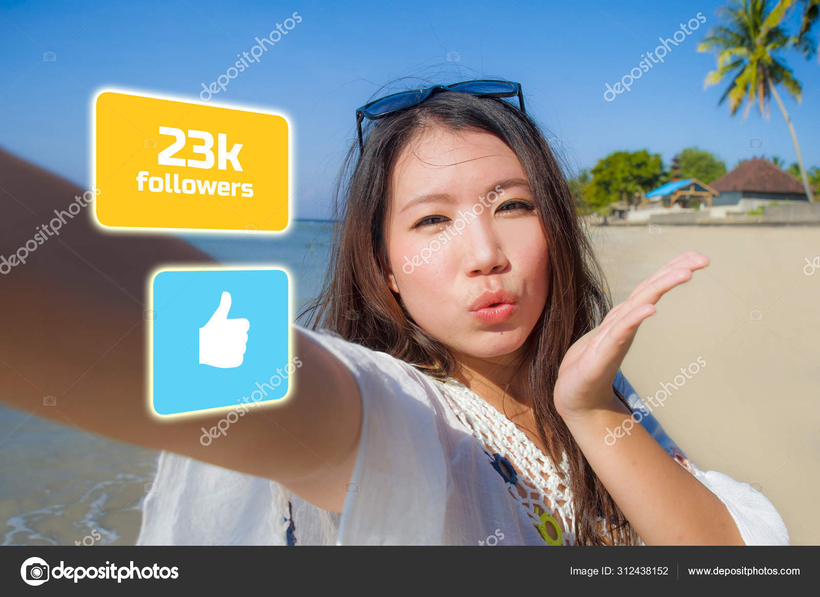 Young beautiful and happy influencer Korean woman taking self portrait ...