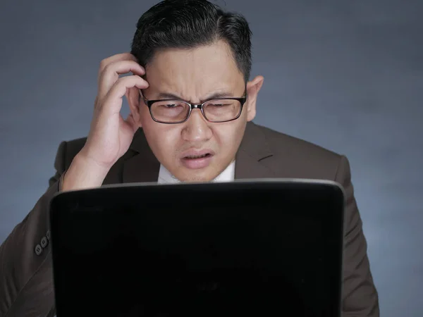 Man Confused When Looking at His Laptop - Stock Image - Everypixel