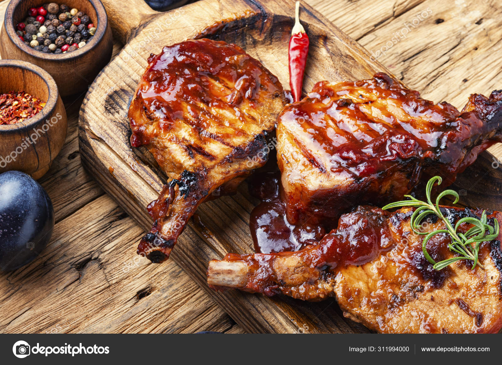 Roasted sliced barbecue pork ribs Stock Photo by ©Nikolay_Donetsk 311994000