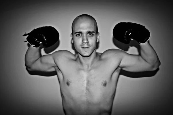 Bald Caucasian man boxing - black and white - Stock Image - Everypixel
