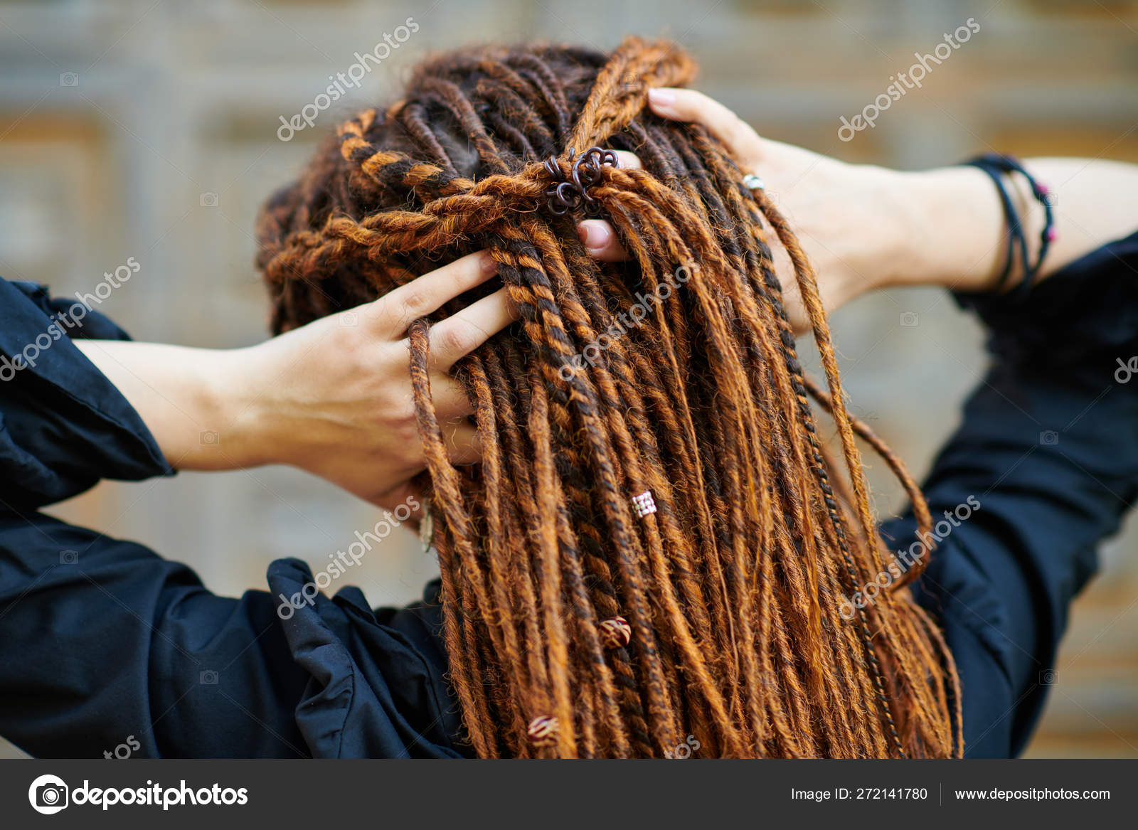 Backside dreadlocks head closeup, fashionable girl posing at old wooden ...