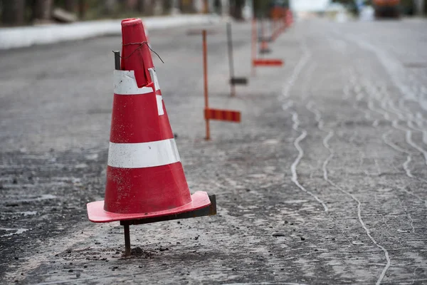 road construction or repair - laying a new layer of asphalt, marking ...