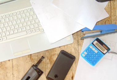 Office table with laptop notebook and cash stack Stock Photo by ...